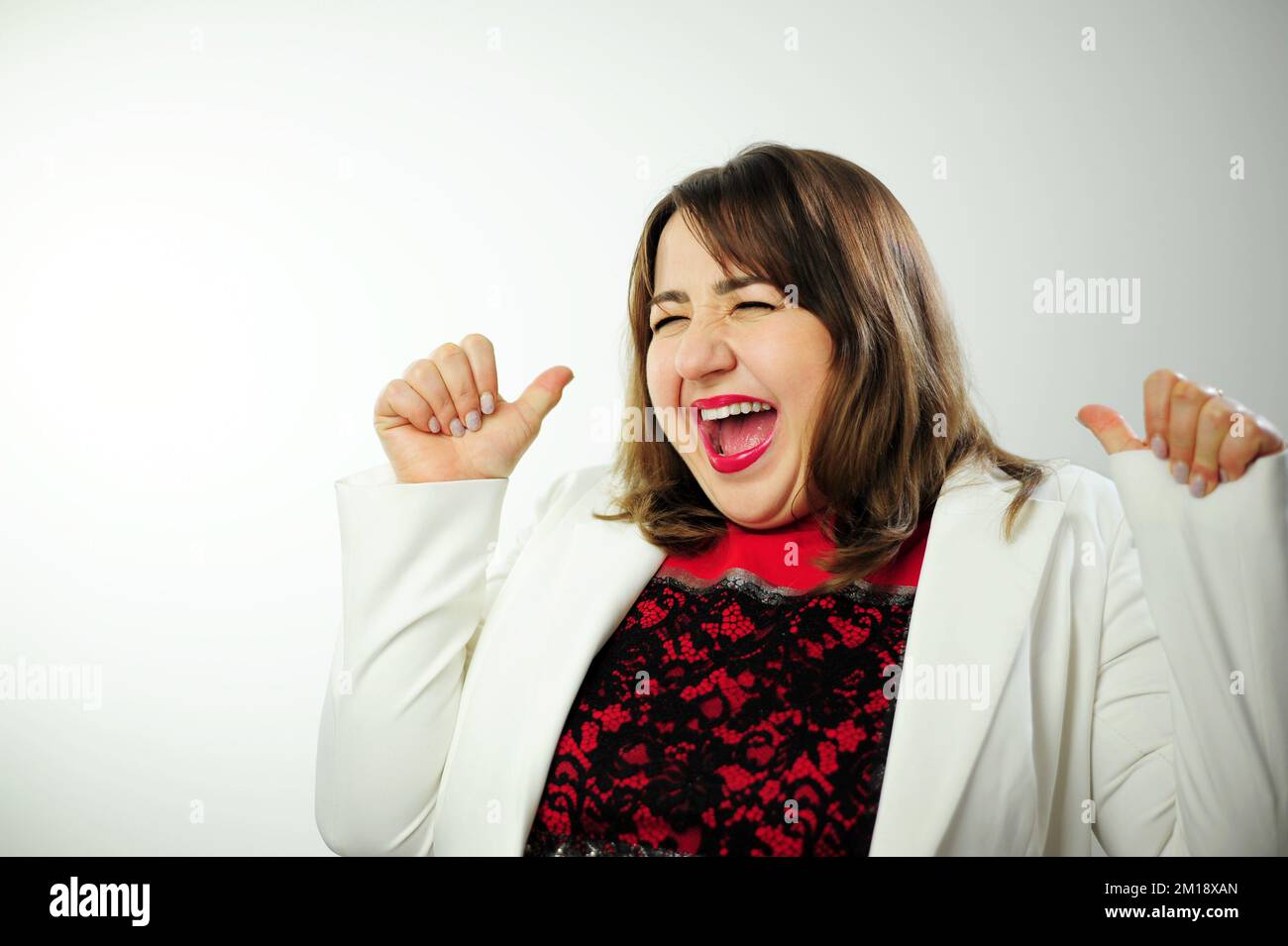 woman standing over dancing happy and cheerful smiling moving casual ...