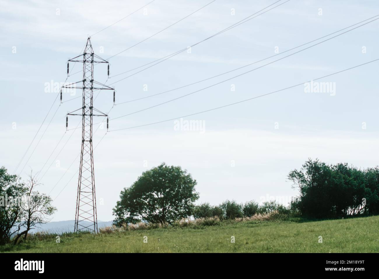 Power Transmission Towers in landscape. hi-voltage electric poles with ...