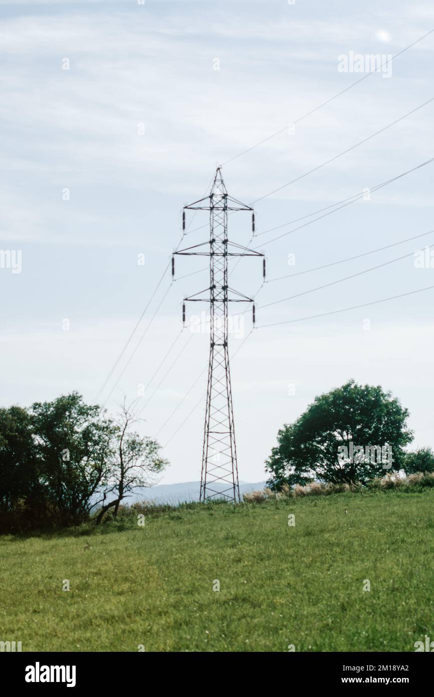 Power Transmission Towers in landscape. hi-voltage electric poles with ...