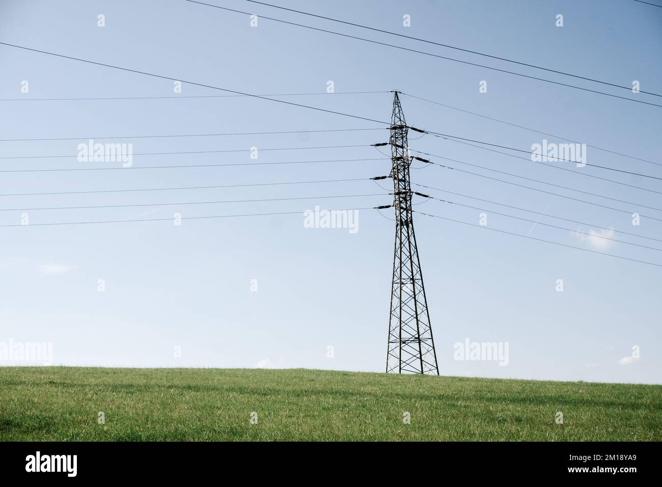 Power Transmission Towers in landscape. hi-voltage electric poles with ...