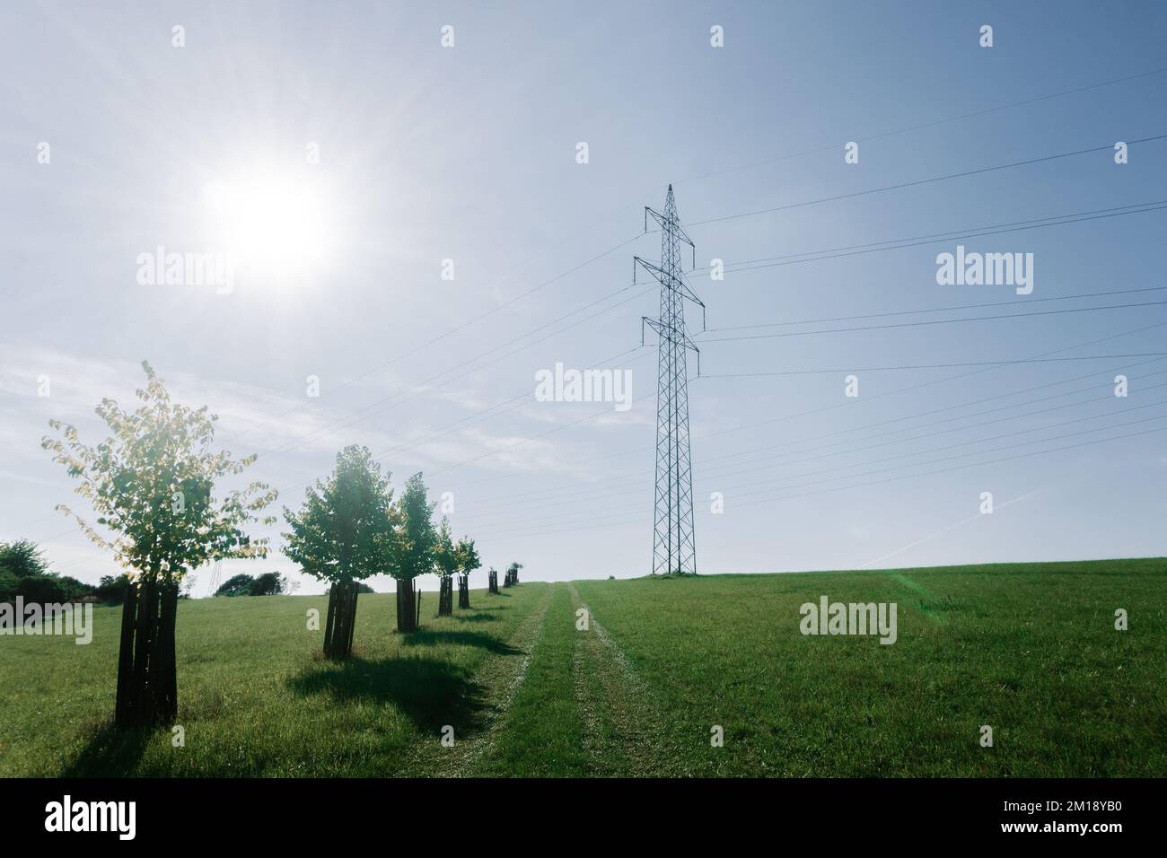 Power Transmission Towers in landscape. hi-voltage electric poles with ...