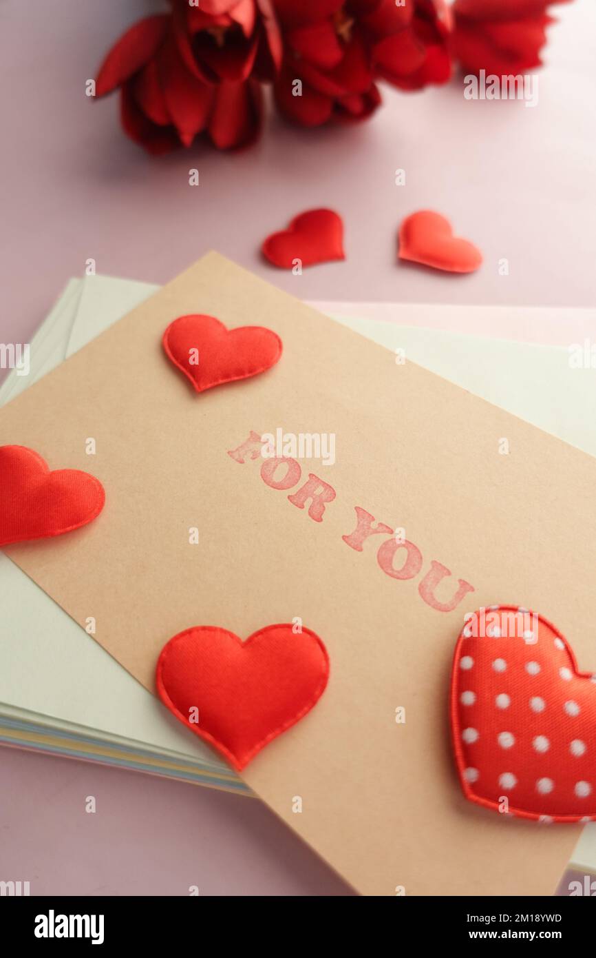 vertical shot of heart shape symbol and envelope Stock Photo - Alamy