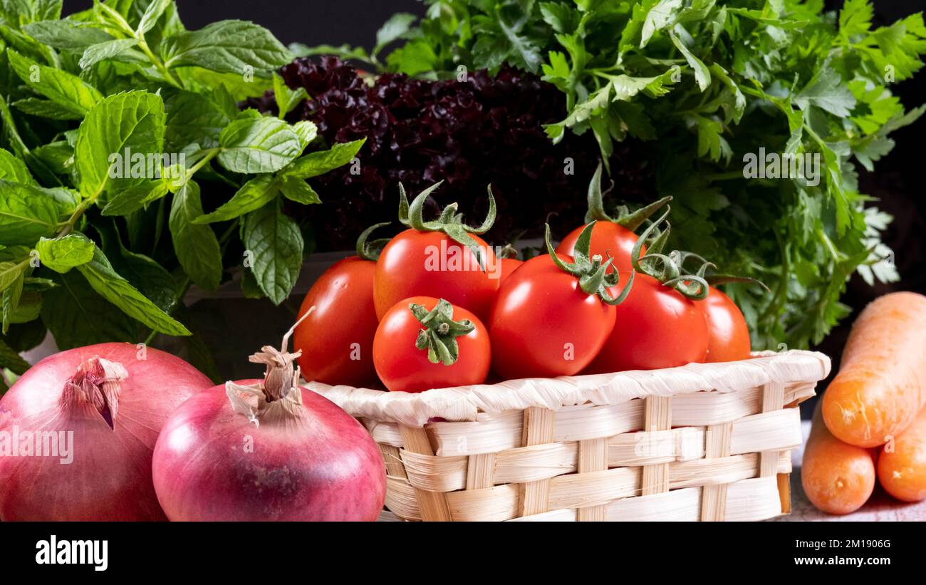 Freshly picked vegetables, cherry tomatoes, mint, green onions, lettuce ...