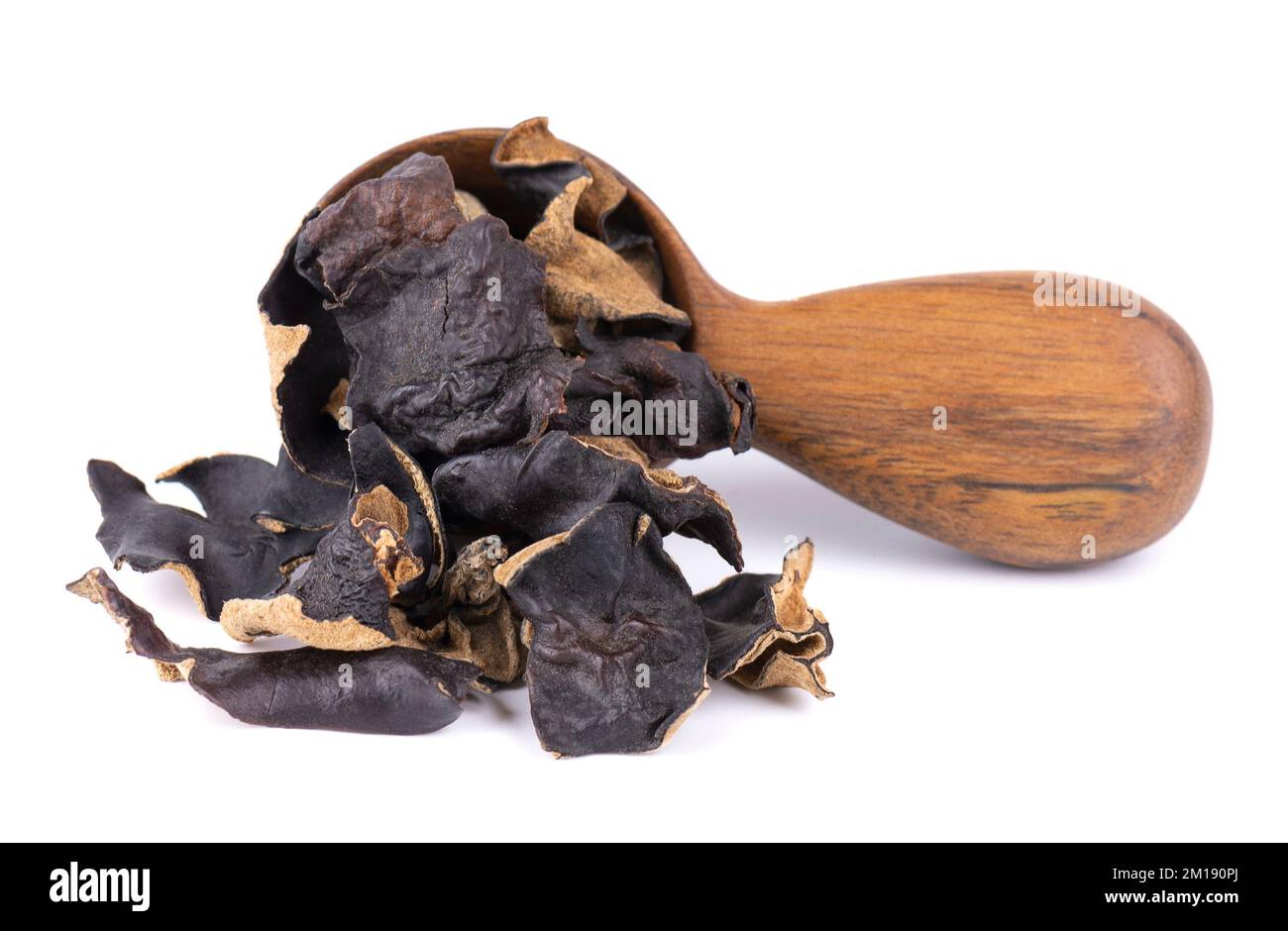Dry black fungus in wooden spoon, isolated on white background. Chinese ...