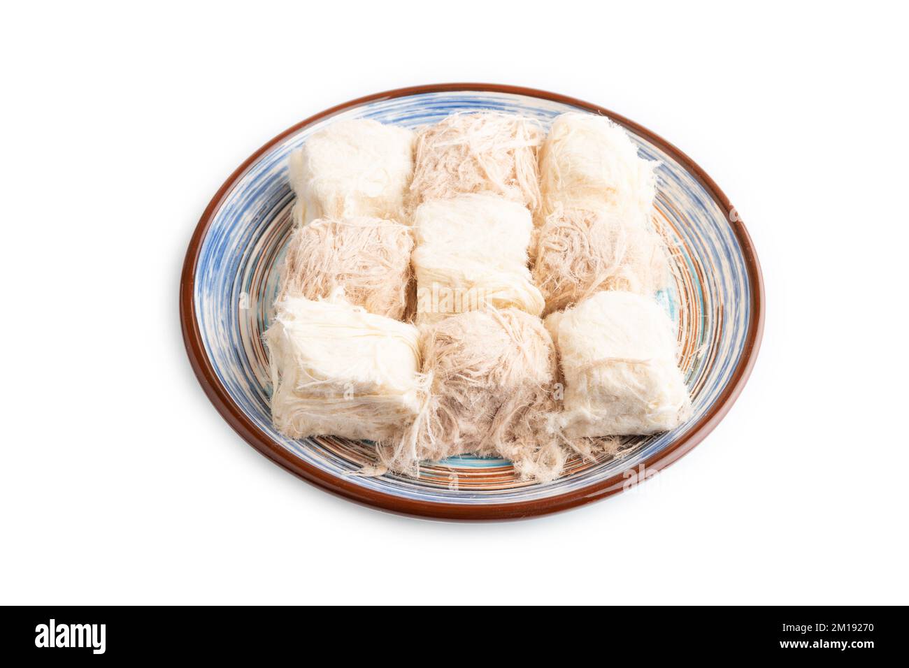 traditional arabic sweets pishmanie isolated on white background. side ...