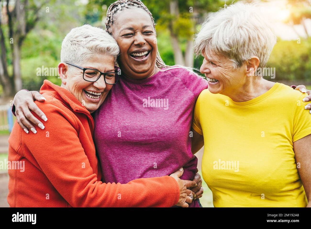 Multiracial senior women having fun together after sport workout ...