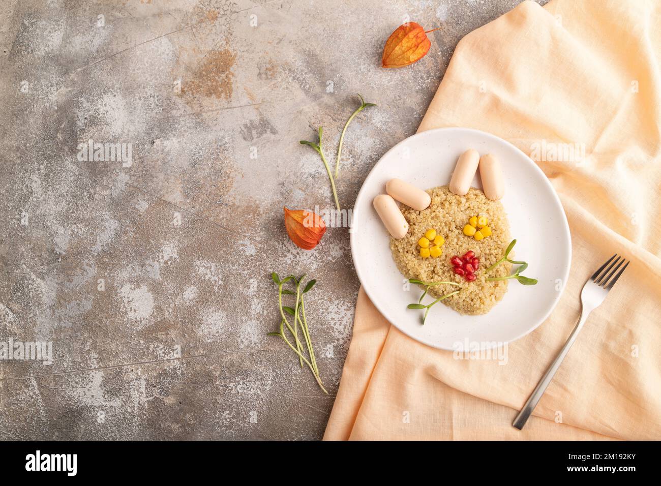 Funny mixed quinoa porridge, sweet corn, pomegranate seeds and small ...