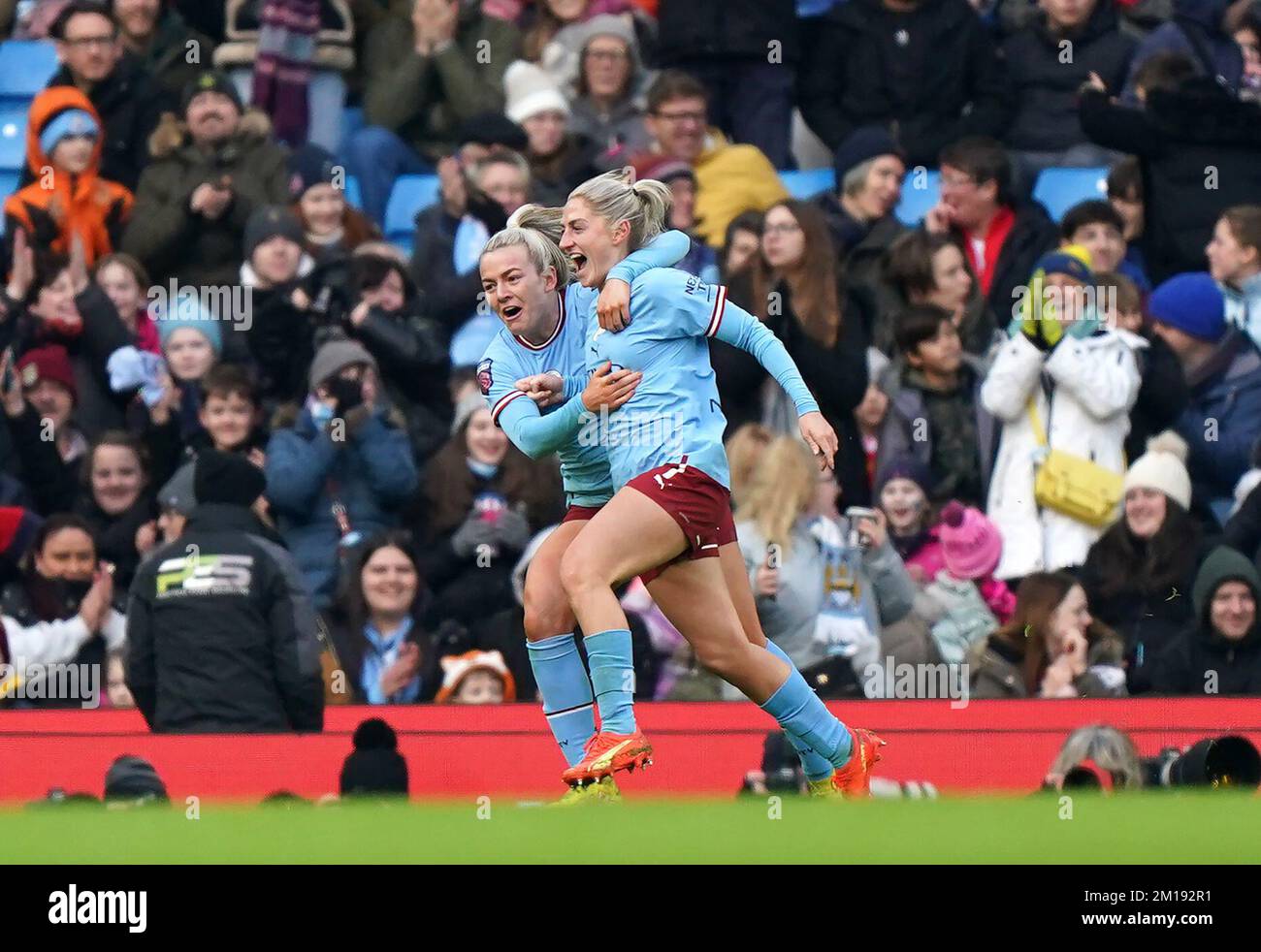 Manchester City's Laura Coombs (right) celebrates scoring their side's ...