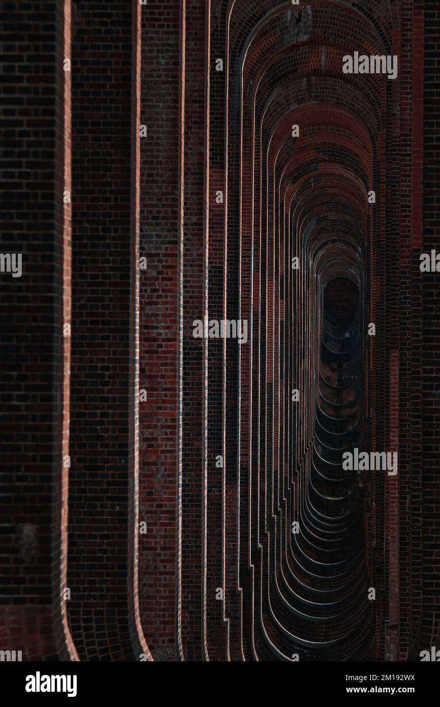 A vertical shot of oval shaped brick walls, cool for background Stock ...