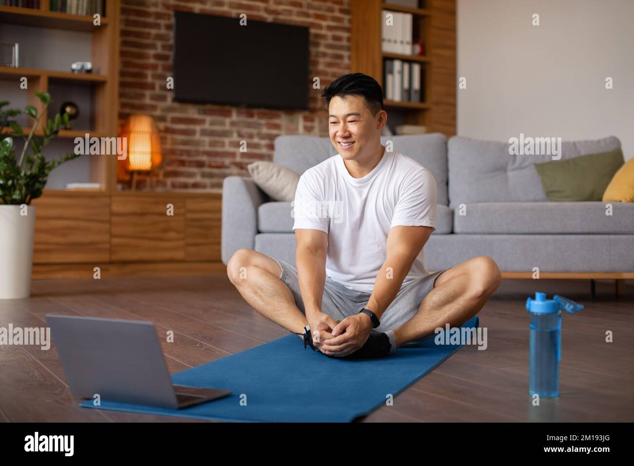 Yoga butterfly doing computer hi-res stock photography and images - Alamy