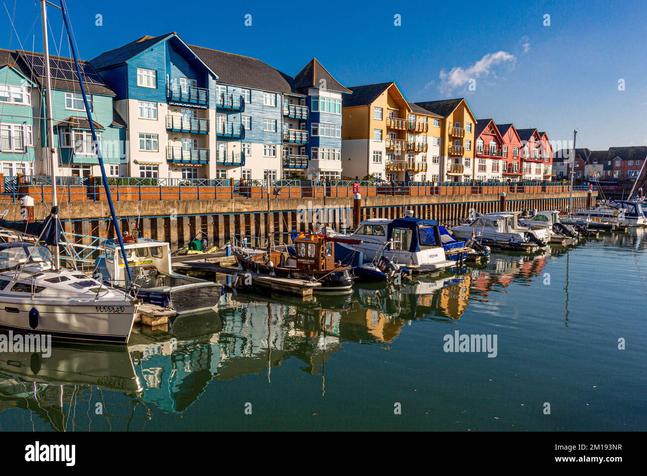 Exmouth marina in the county of Devon, United Kingdom surrounded by colourful appartment ...