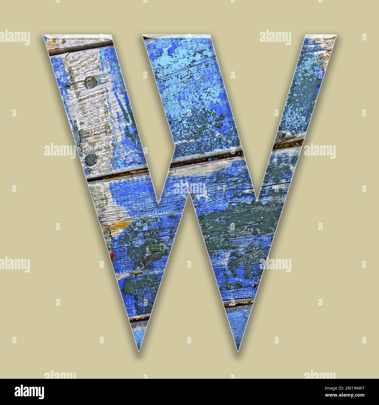 Monogram with capital letter W, Design Old painted wood Stock Photo - Alamy