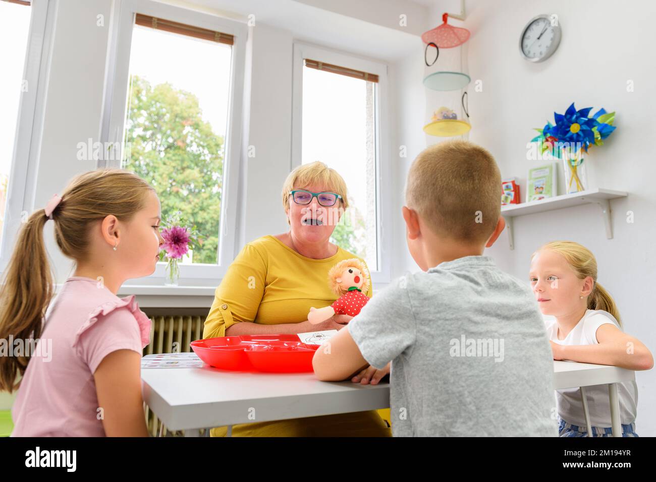 Children speech therapy concept. Children practicing correct ...