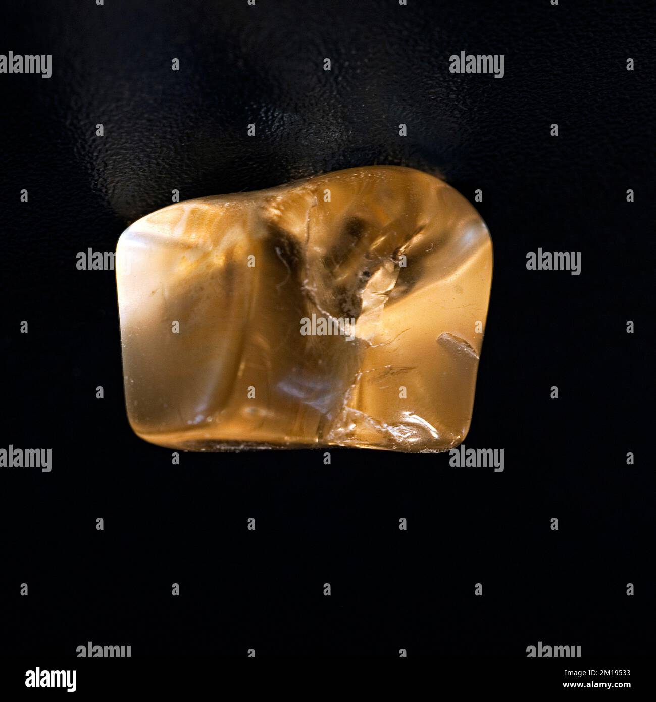 Golden Labradorite macro close up colour photograph of a polished '' a ...