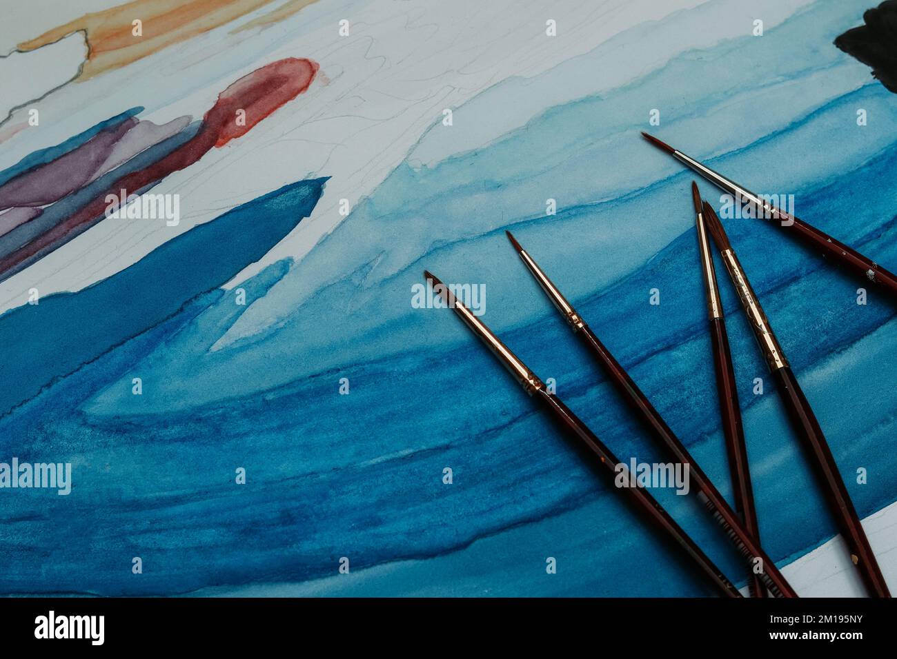 Artist props collection on table. composition of messy stationery tools ...