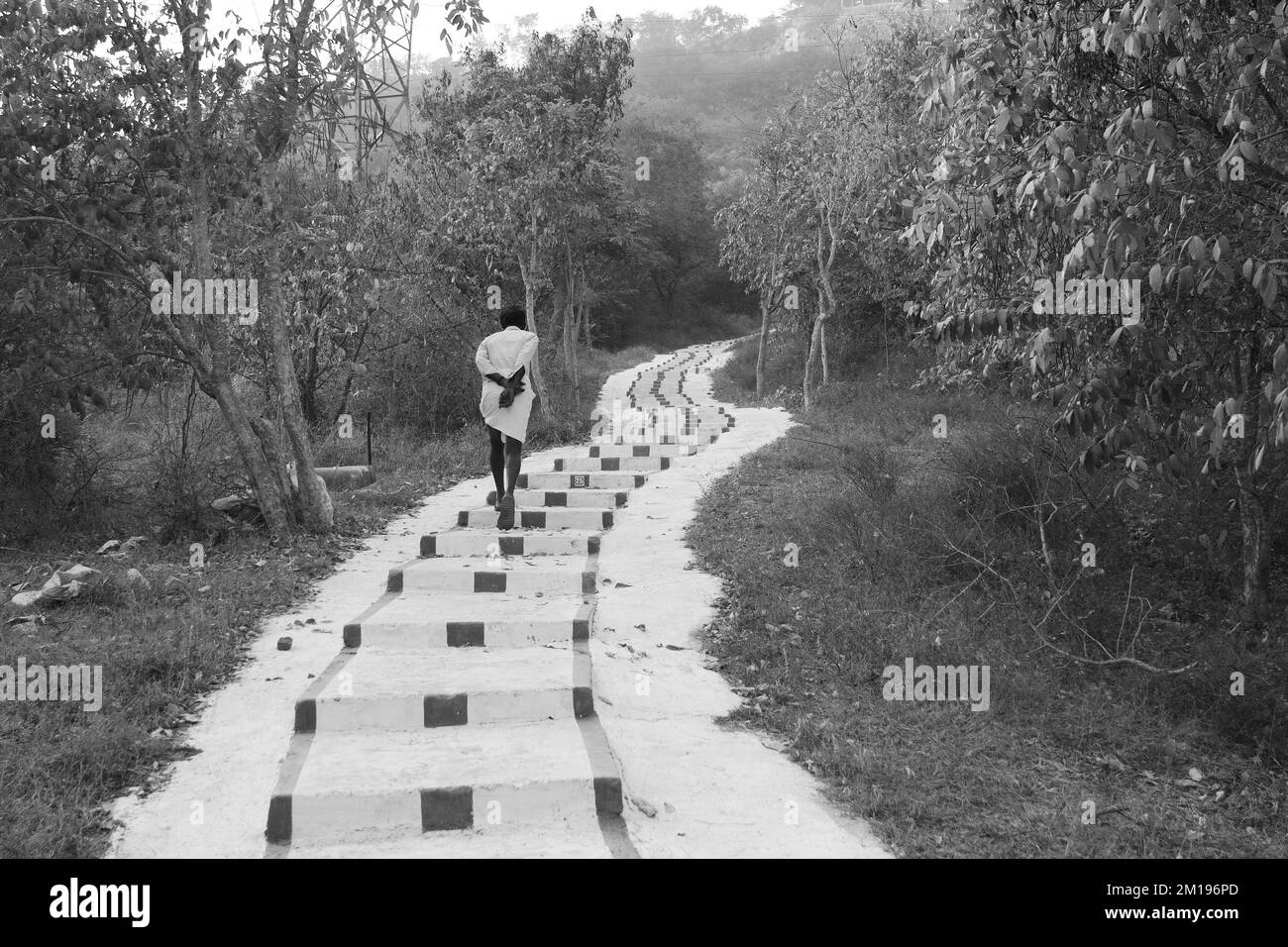 Man in dark garden Black and White Stock Photos & Images - Alamy