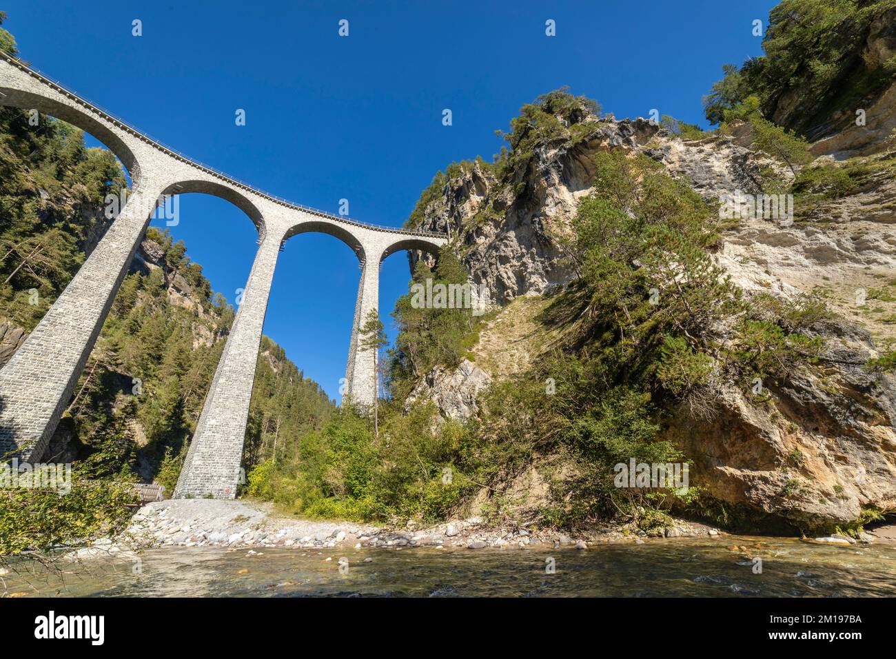 Swiss train over Landwasser Viaduct bridge in the alps, Graubunden ...