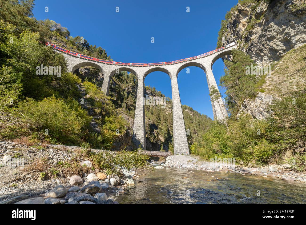 Swiss train over Landwasser Viaduct bridge in the alps, Graubunden ...