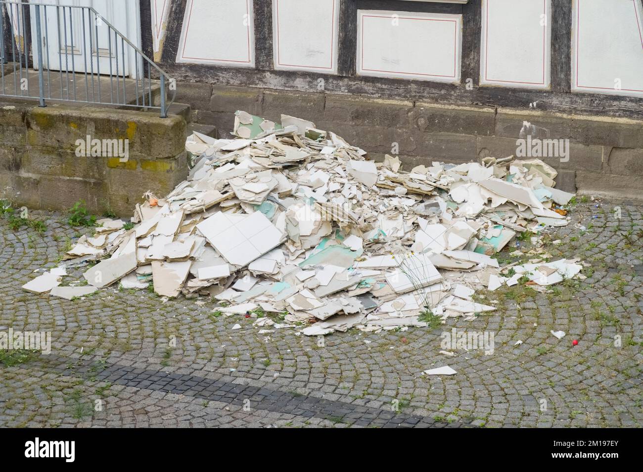 Pile of construction debris near city building, construction waste ...