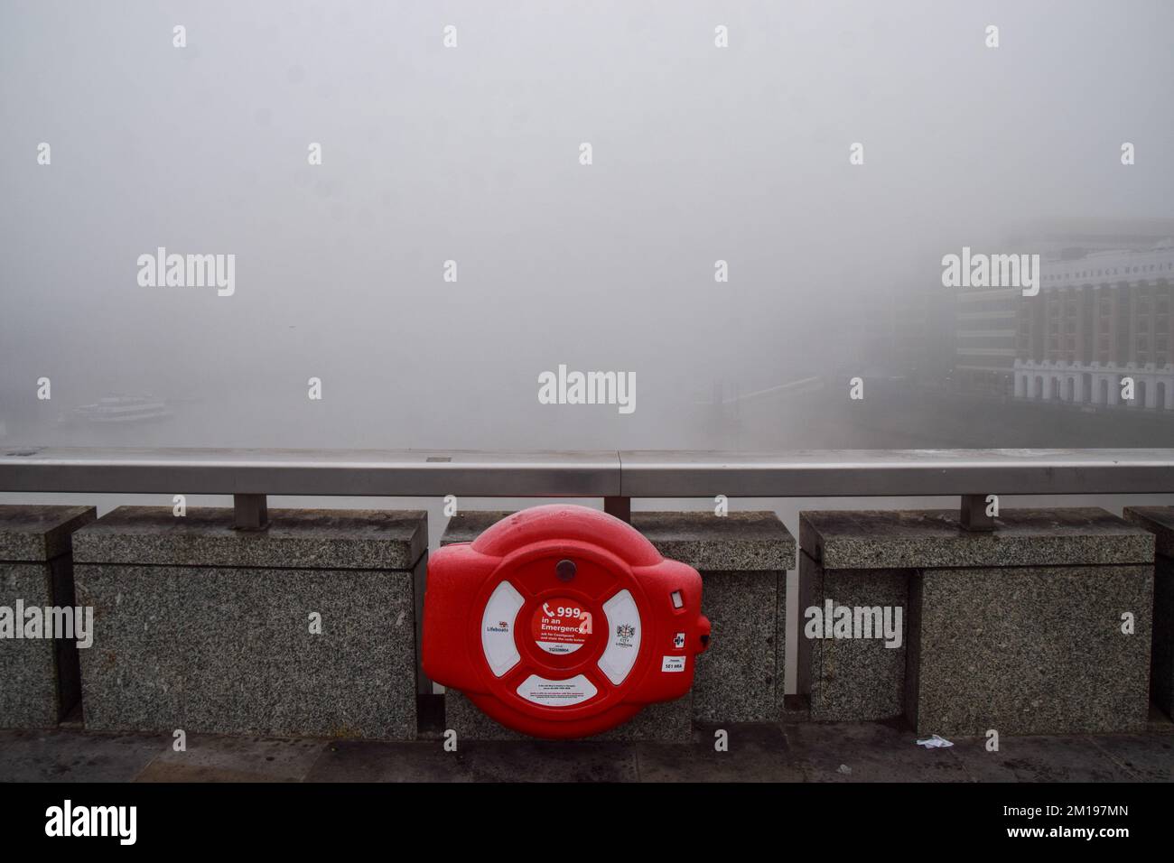 London, UK. 11th December 2022. Tower Bridge disappears completely ...