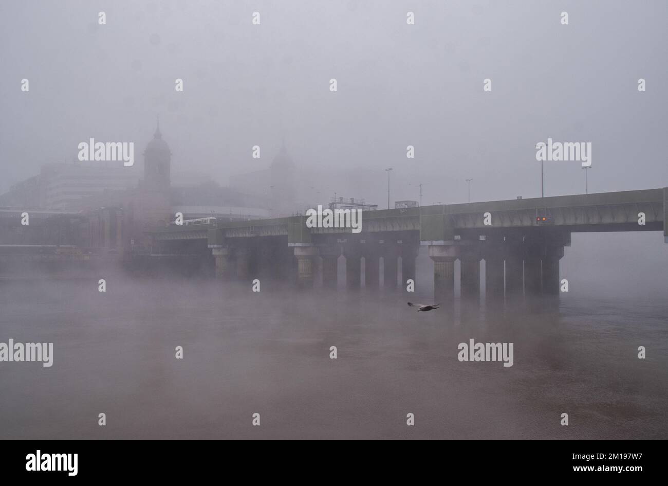 London, UK. 11th December 2022. The City of London skyline disappears ...