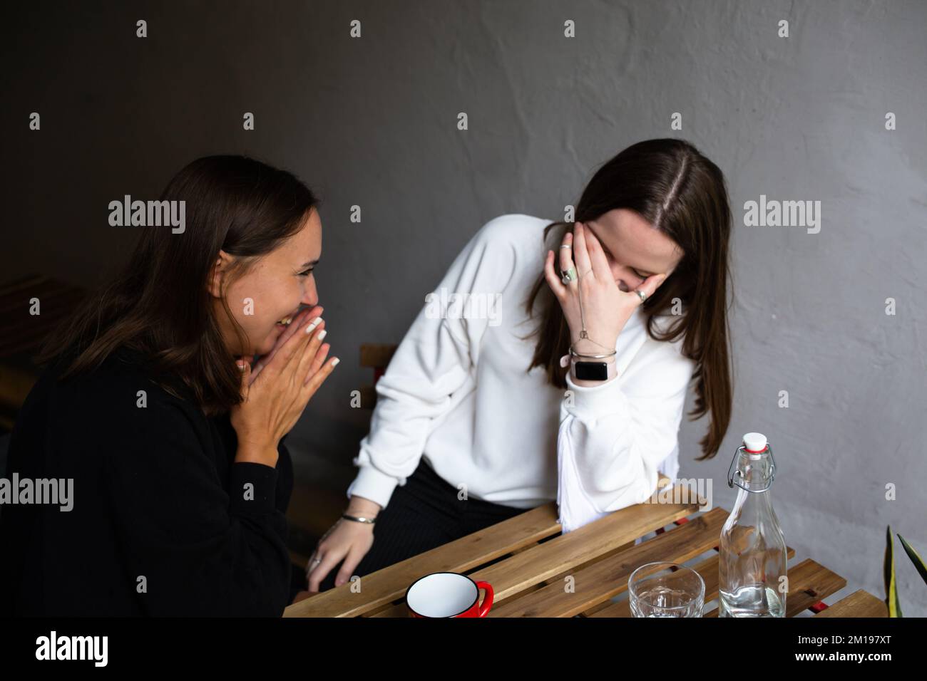 Two girlfriends conversation in hi-res stock photography and images - Alamy