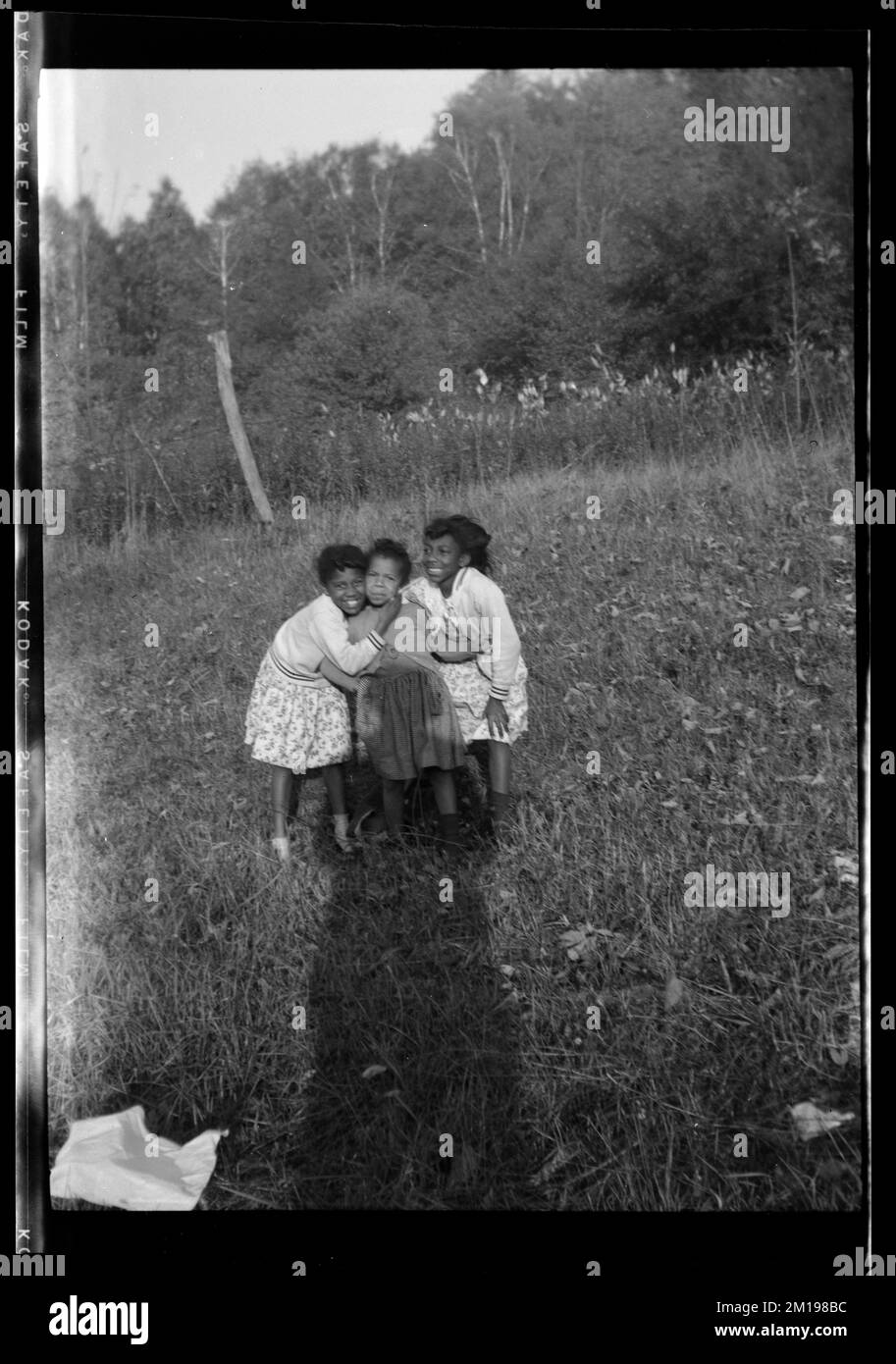Three girls in a field , Girls. Jack Miller Collection Stock Photo - Alamy