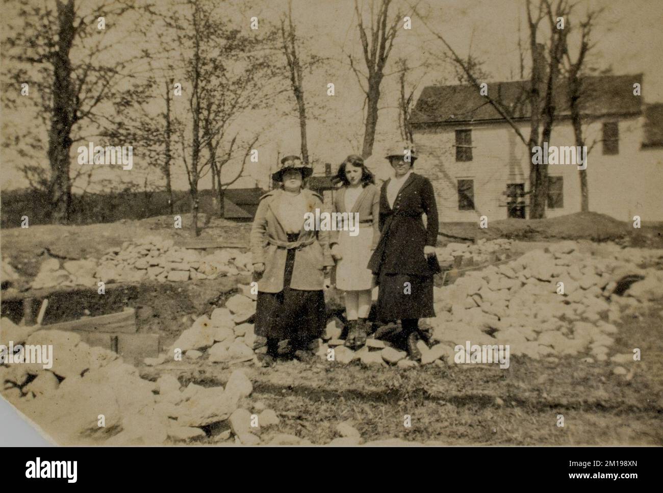 Three women, a house, and some rocks , Houses, Excavation, Masonry ...