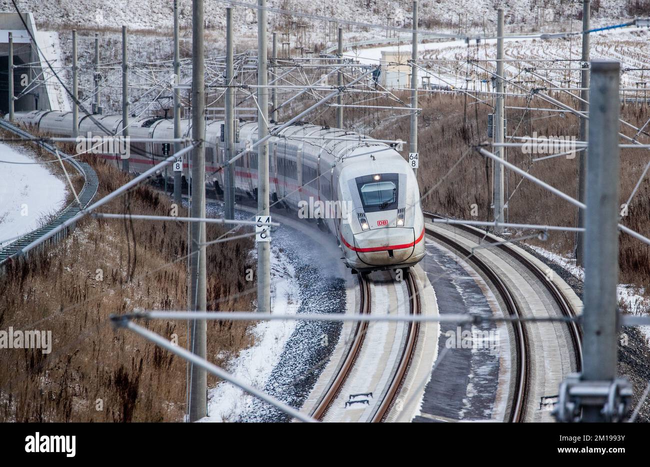 Merklingen, Germany. 11th Dec, 2022. An ICE high-speed train runs near ...