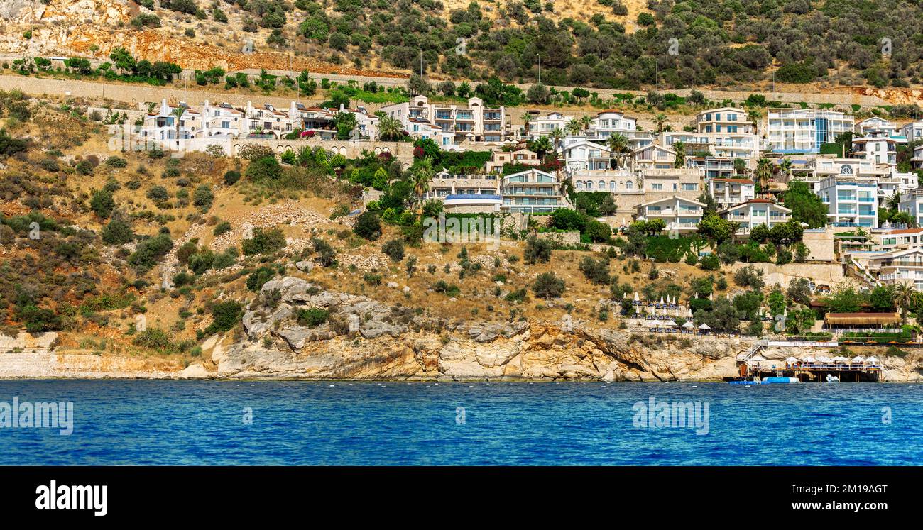 Luxury beach houses by the sea in Antalya. View from the sea. Coastal ...