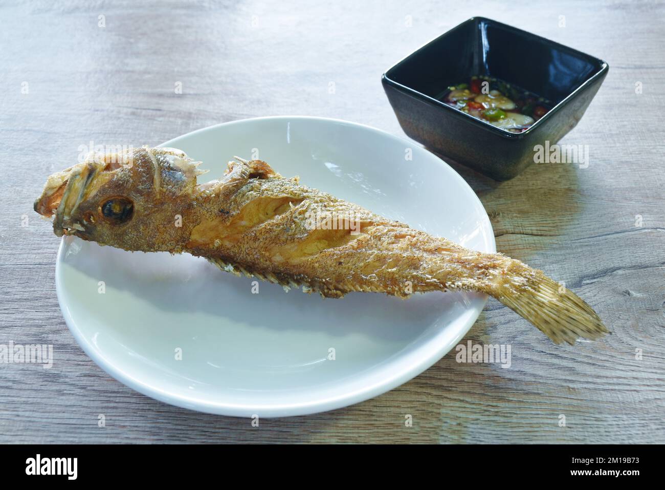 Deep fried grouper fish hi-res stock photography and images - Alamy