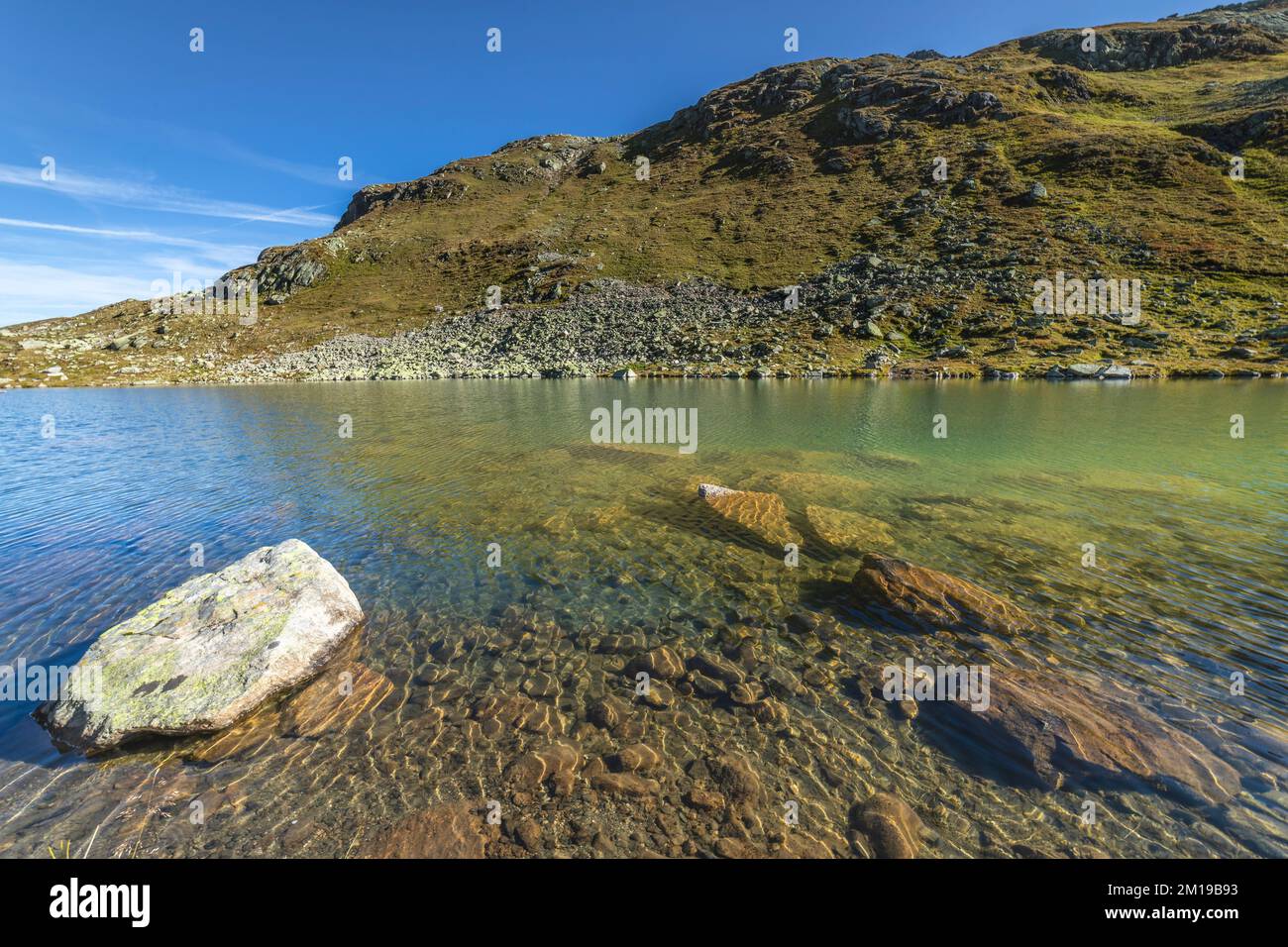 Alpine Lake at Fluela Pass in Graubunden alps, Grisons, Switzerland ...