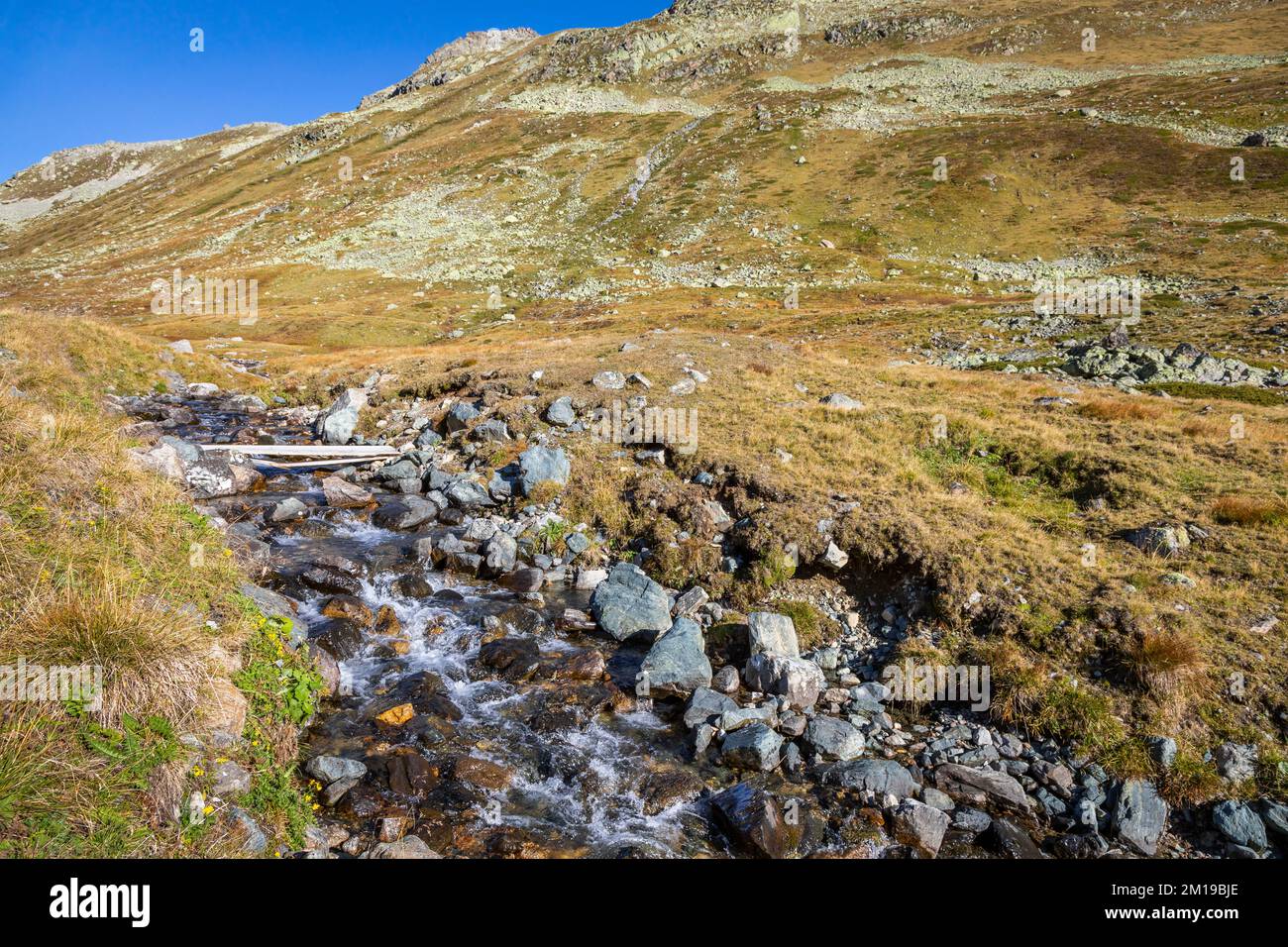 Alpine river in Engadin Valley at sunrise, Graubunden alps, Grisons ...