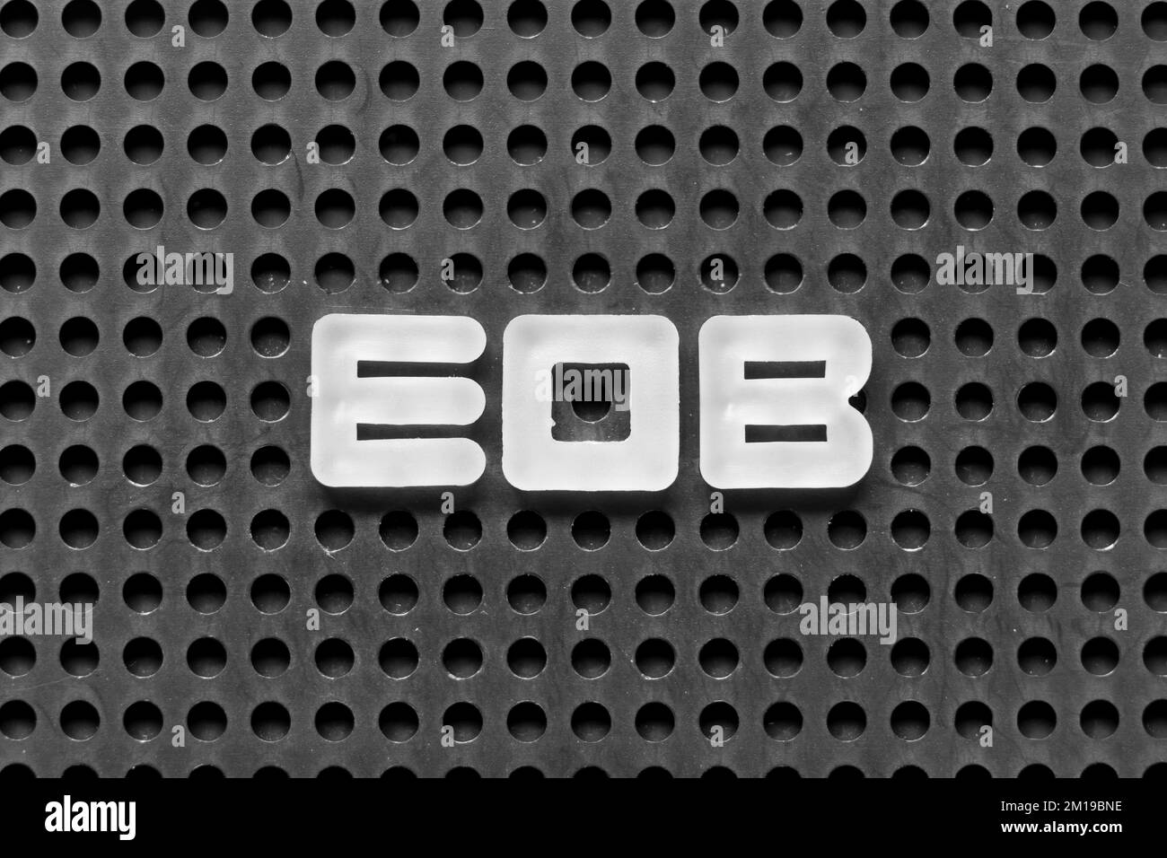 White alphabet letter in word EOB (Abbreviation of end of business) on ...