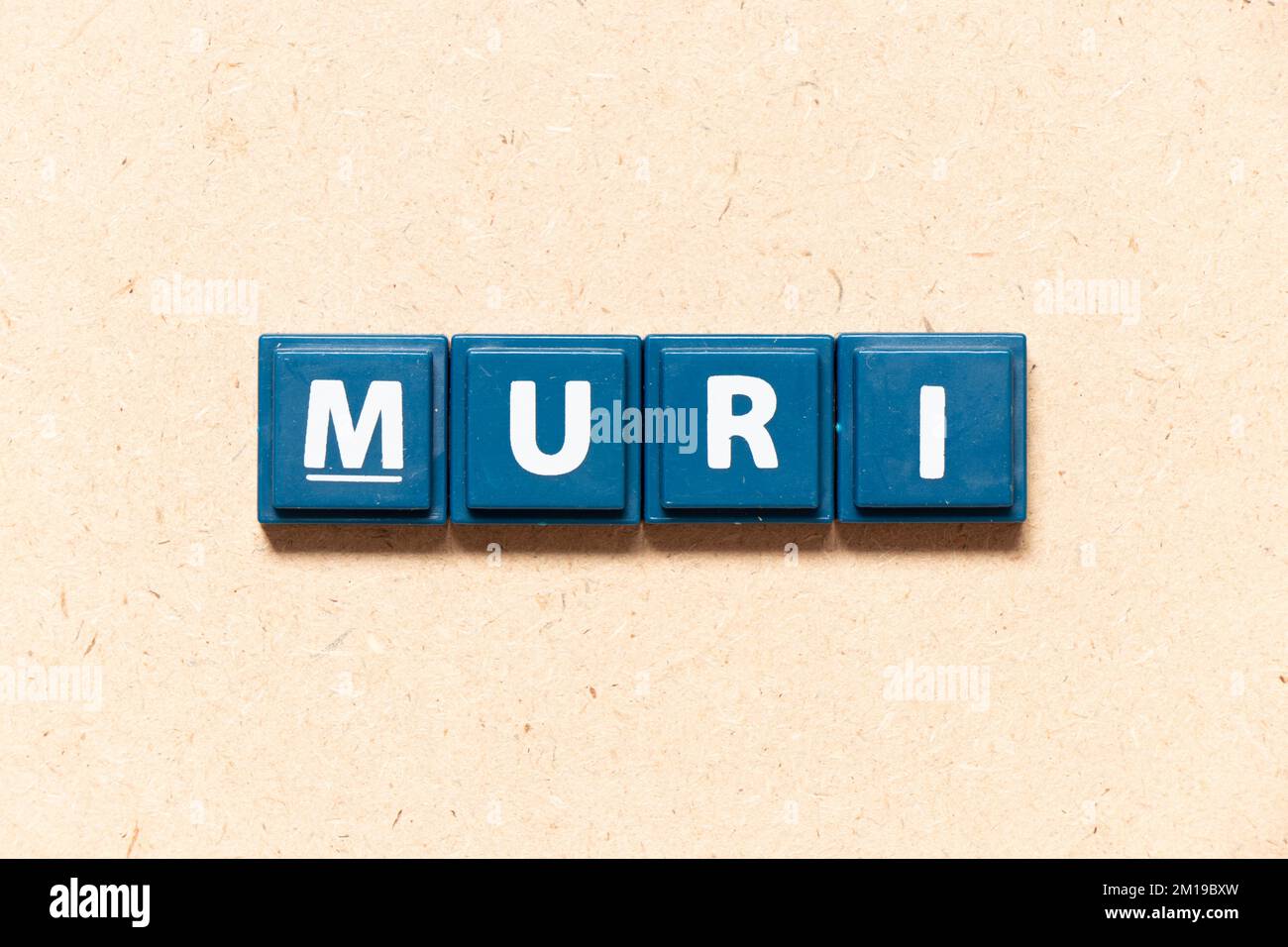 Tile letter in english word muri on wood background Stock Photo - Alamy