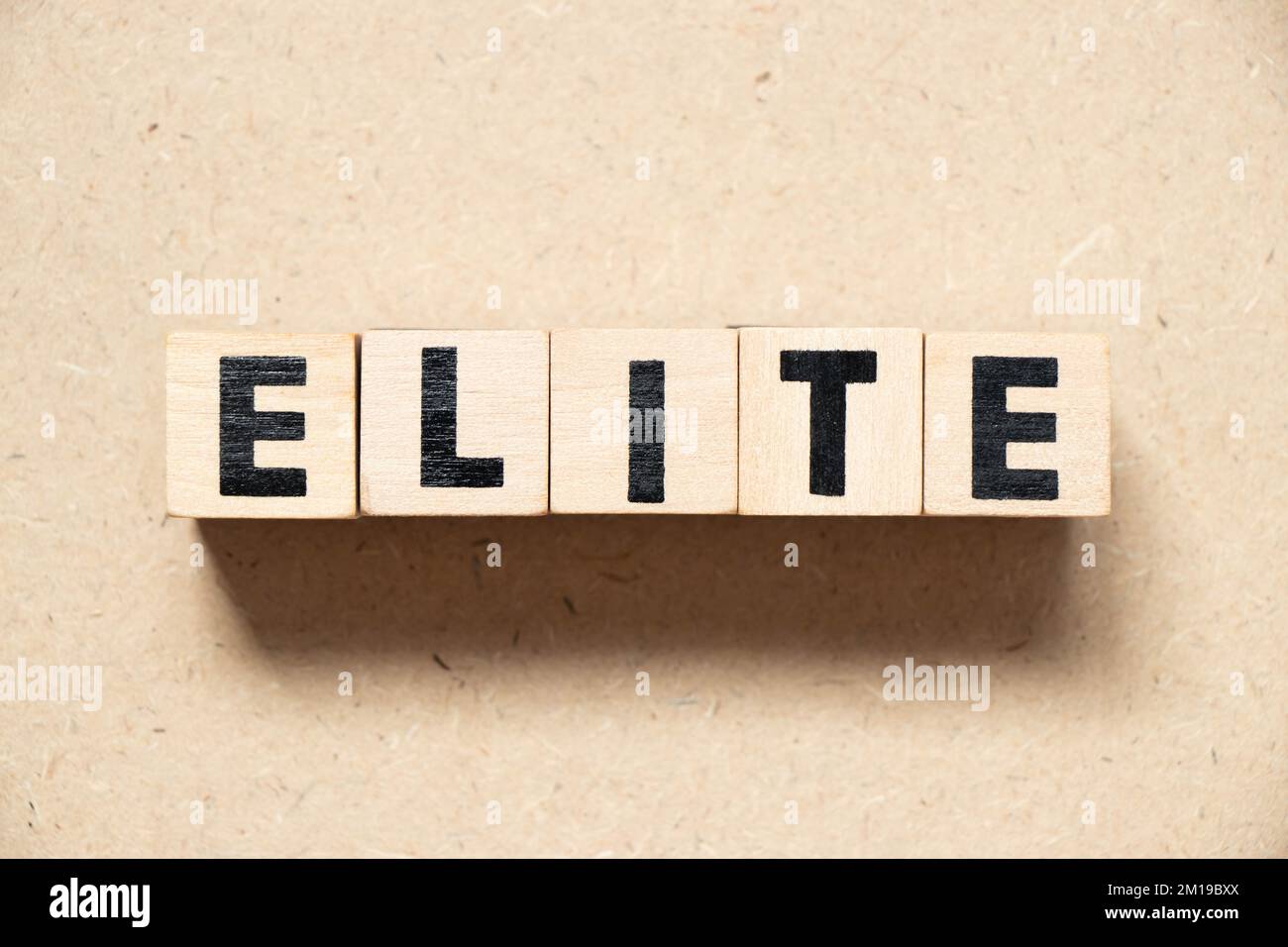 Alphabet letter block in word elite on wood background Stock Photo - Alamy