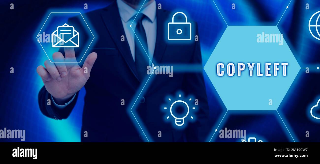 Hand writing sign Copyleft. Word Written on the right to freely use ...