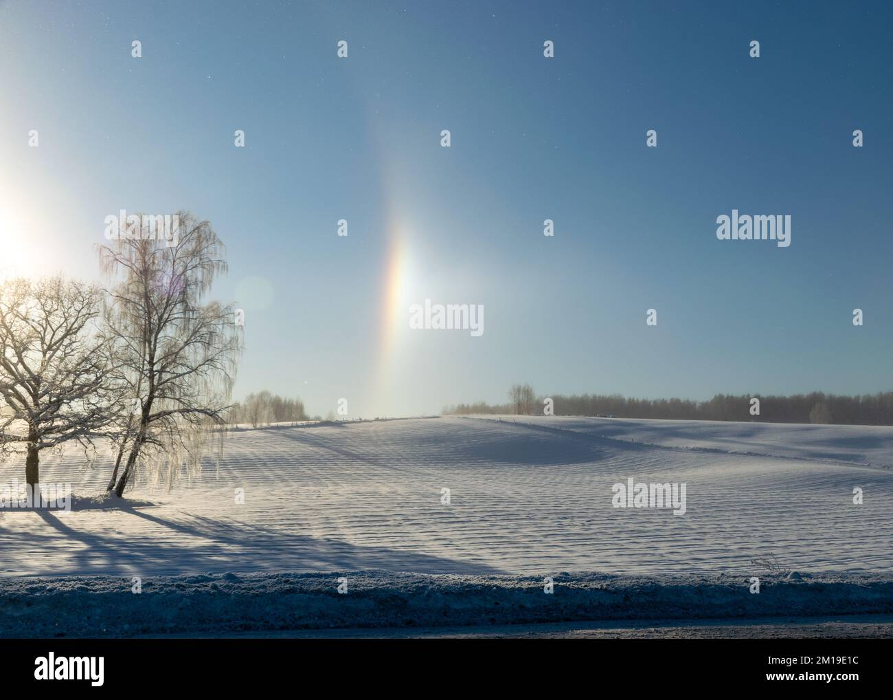 Halo effect on a winter morning. Sunny and shining light, cold weather ...