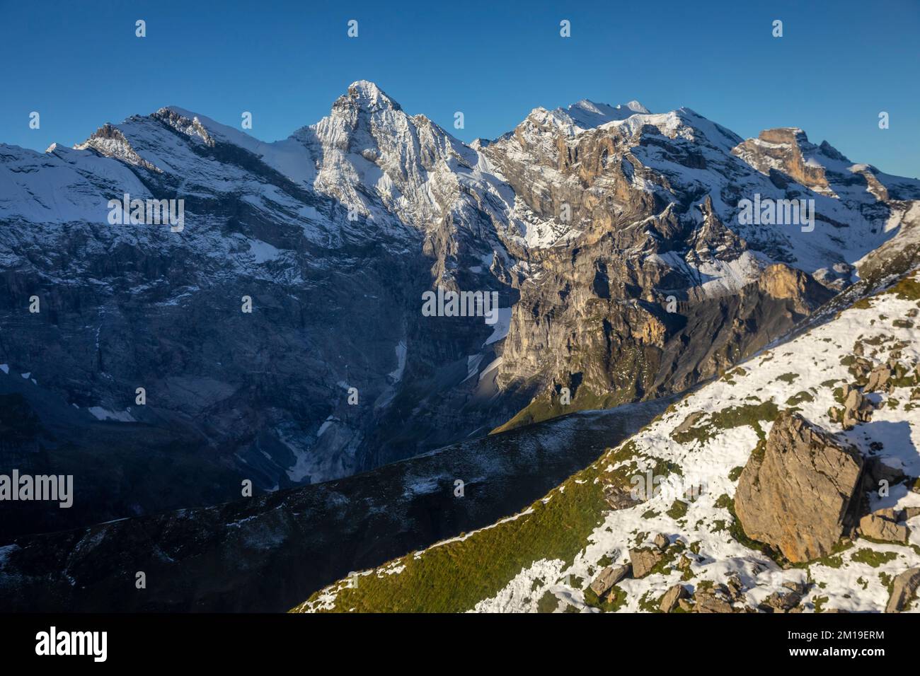 Top of the Schilthorn and view of Breithorn and Bernese Swiss alps ...