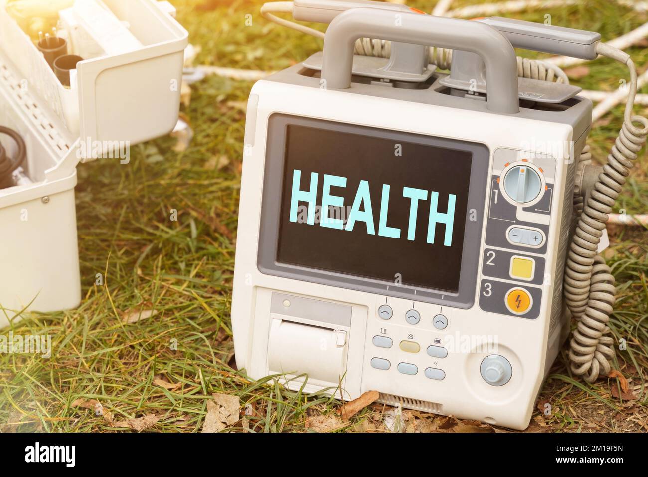 Medicine and health concept. The text is written on the defibrillator ...