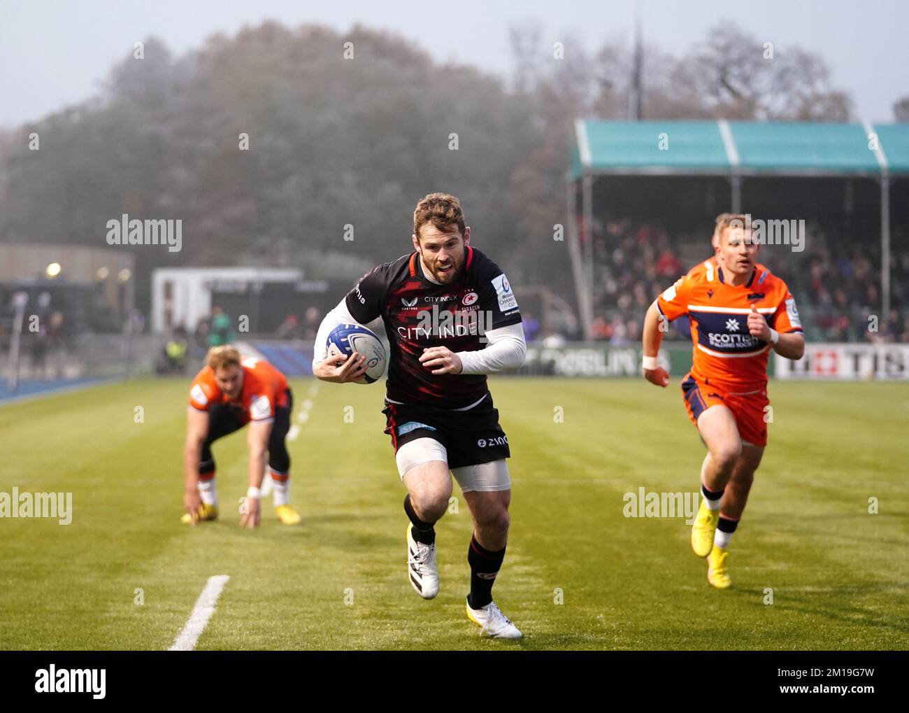 Saracens' Elliot Daly breaks though to score their side's first try of ...