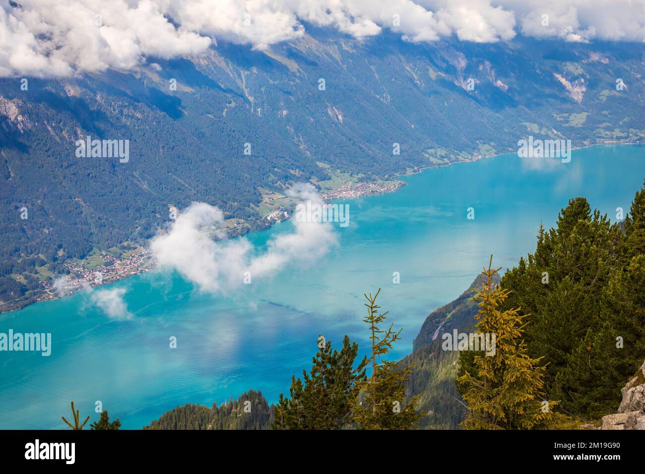 Aerial view of Swiss Alps and Lake Brienz at dramatic sunset ...