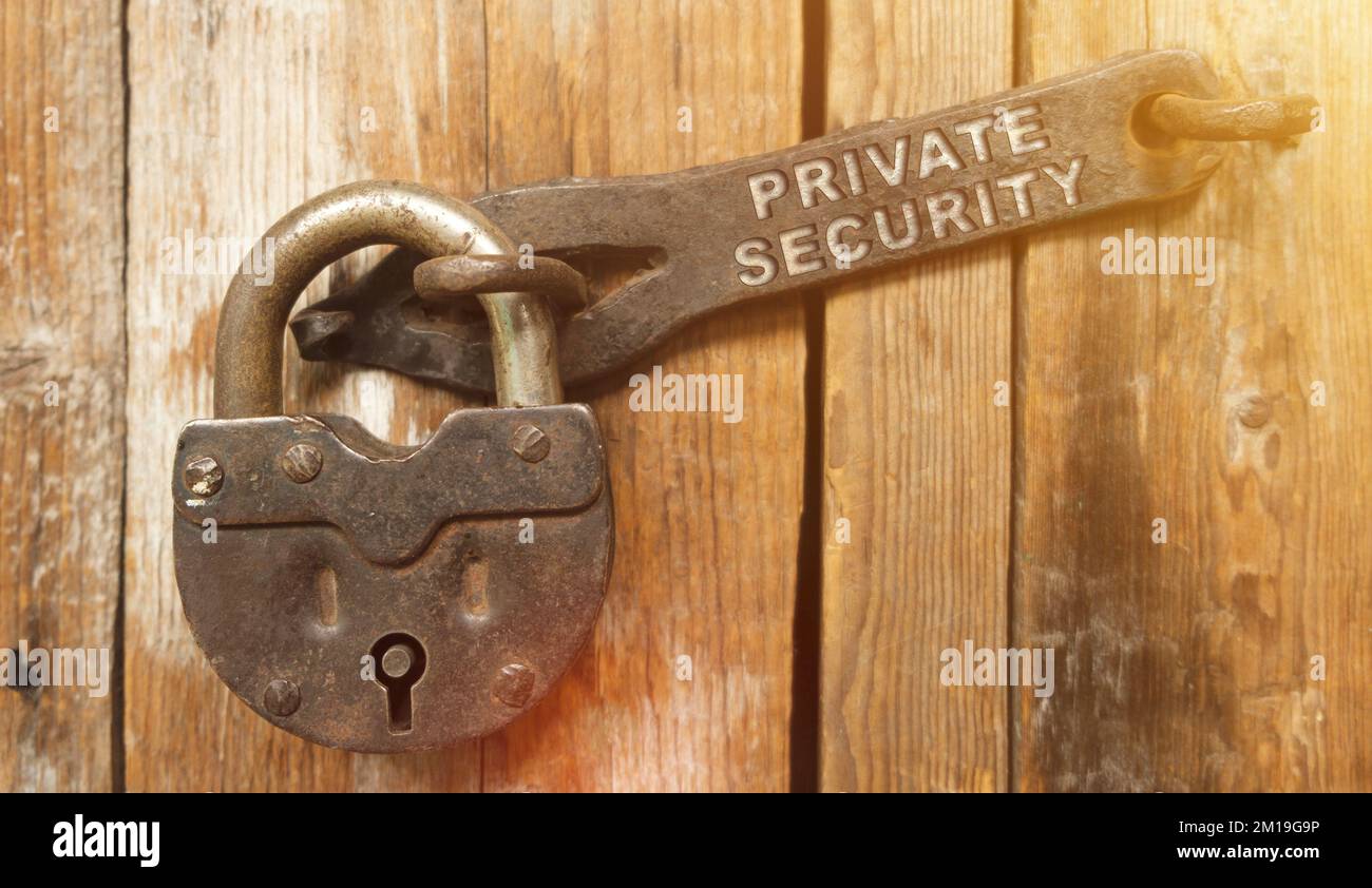 Security concept. There is a lock on the door on the metal part of ...