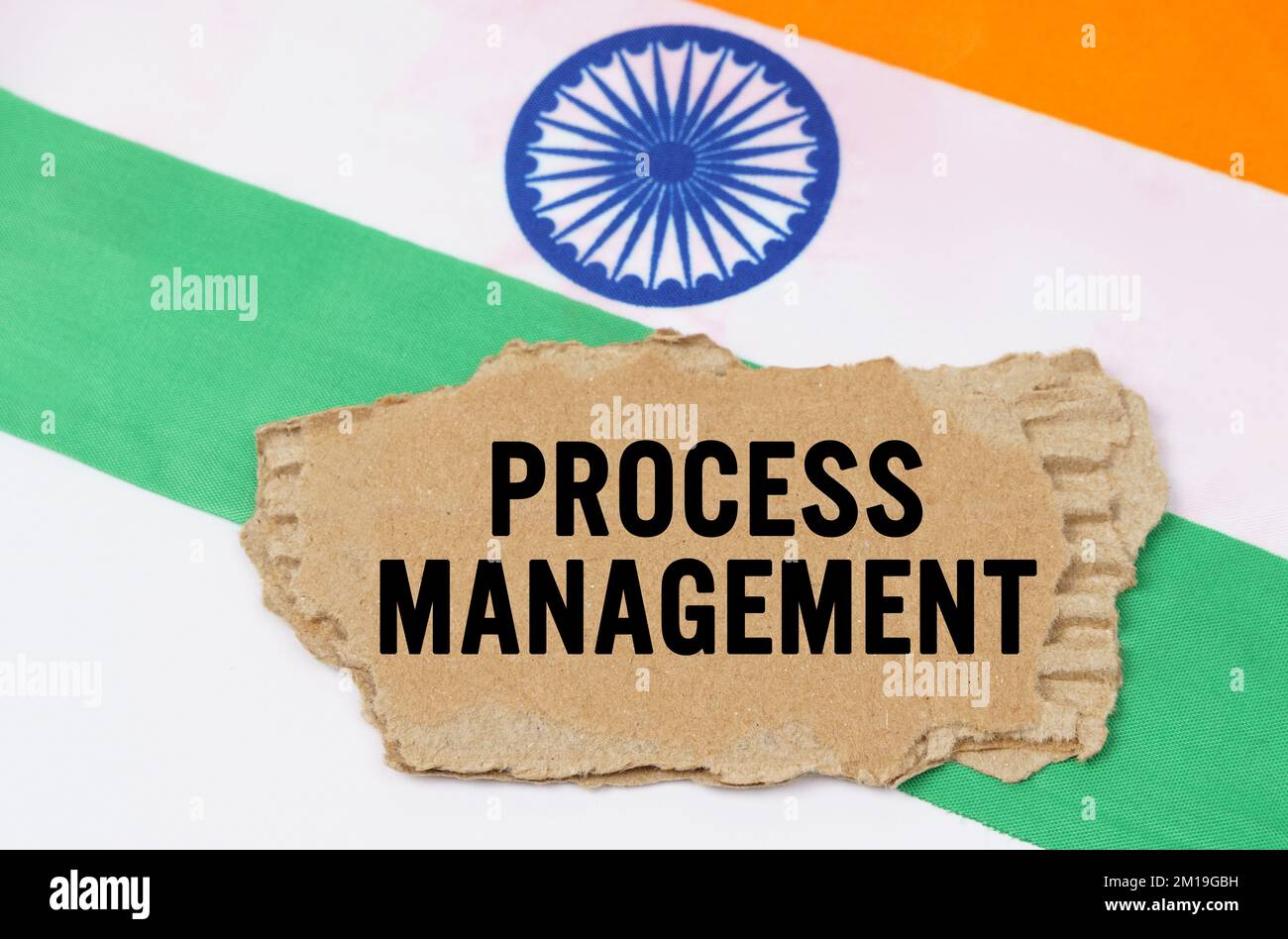 Business and finance concept. The Indian flag has a cardboard box with ...