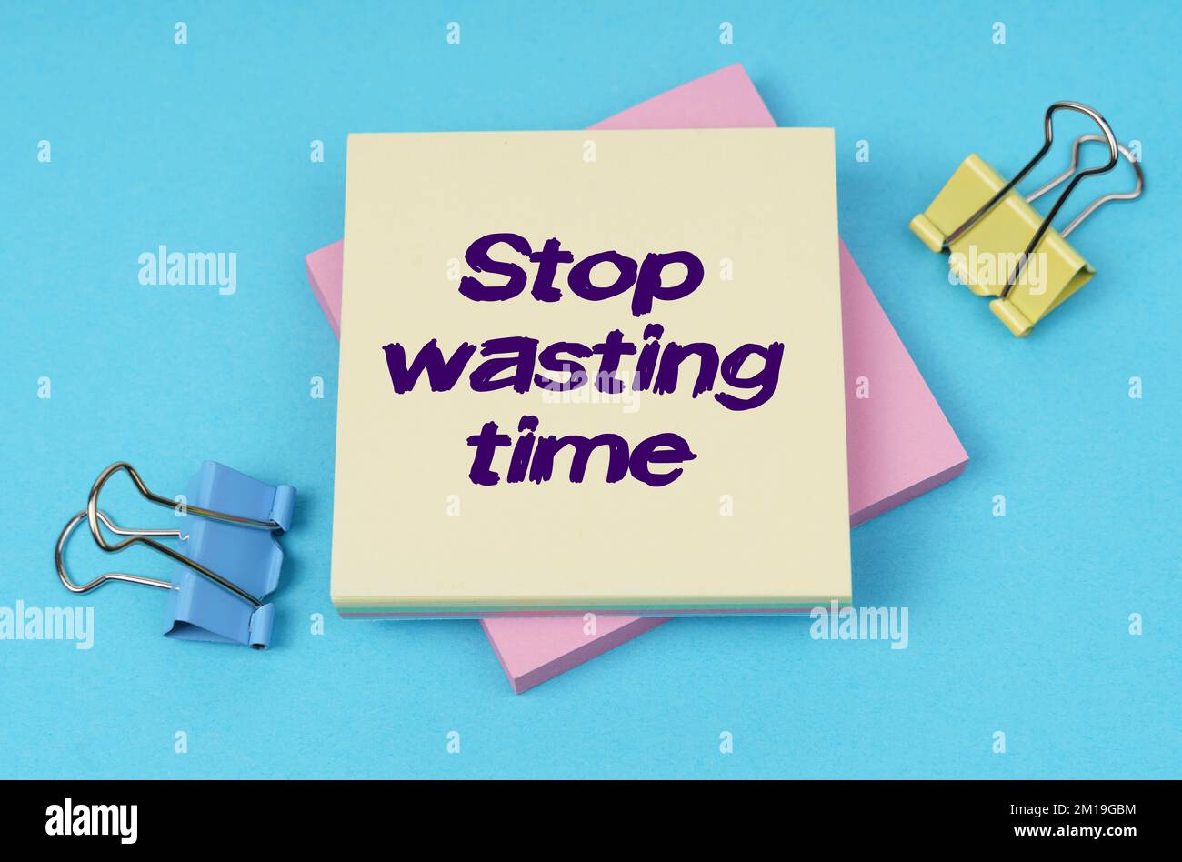 Business and finance concept. On the table are paper clips, note paper ...