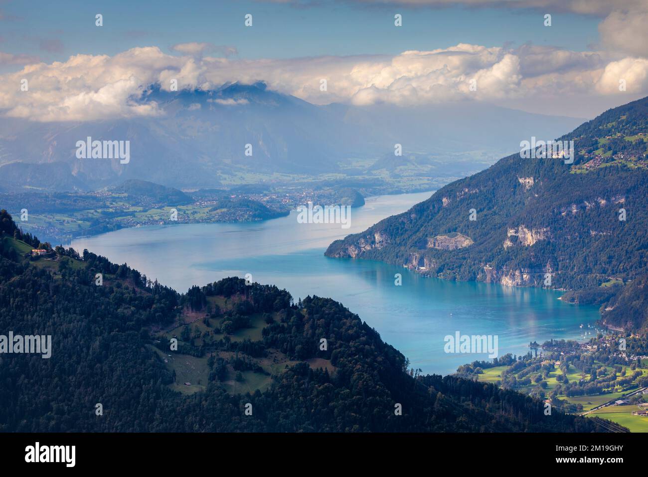 Aerial view of Swiss Alps and Lake Thun at dramatic sunset, Interlaken ...