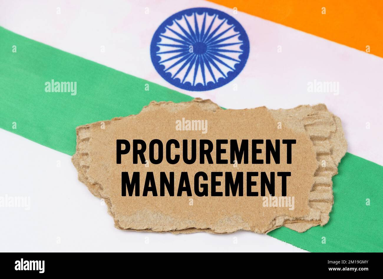 Business and finance concept. The Indian flag has a cardboard box with ...