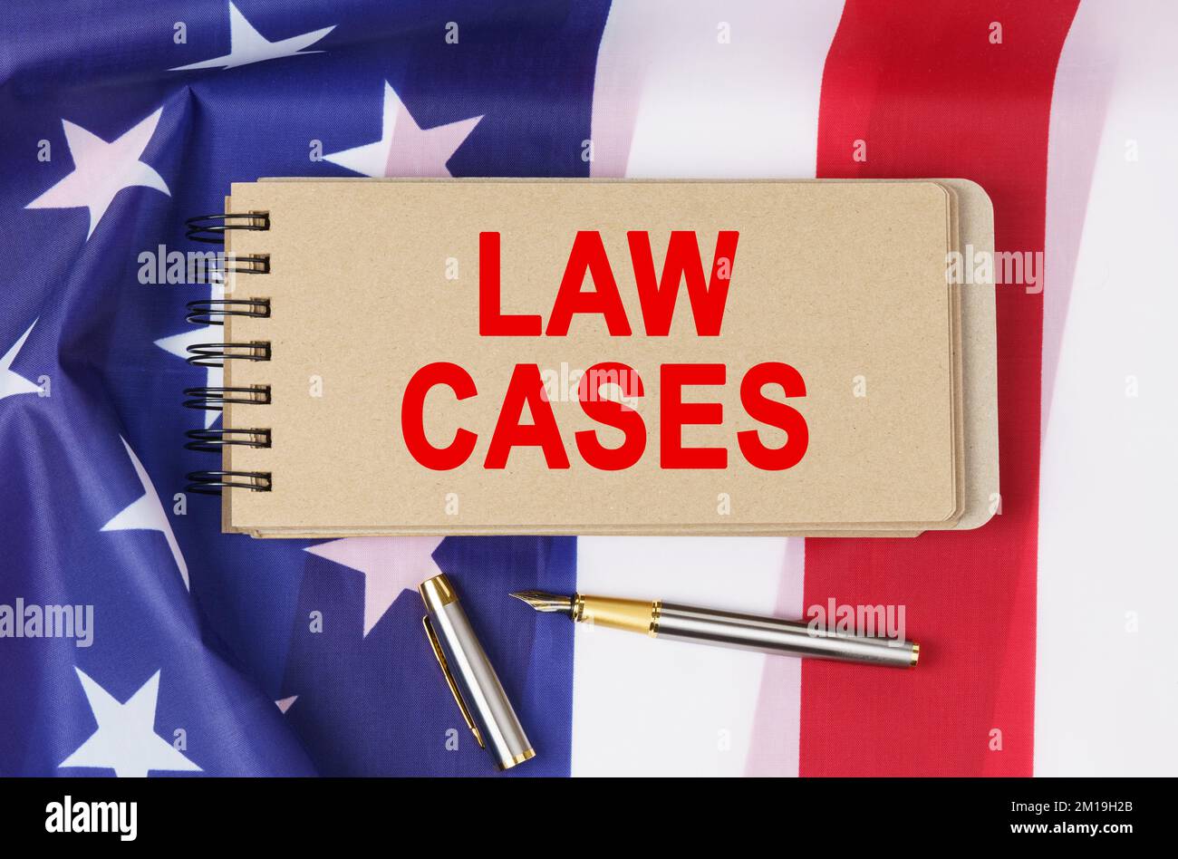 Law and order concept. Against the background of the flag of the United ...