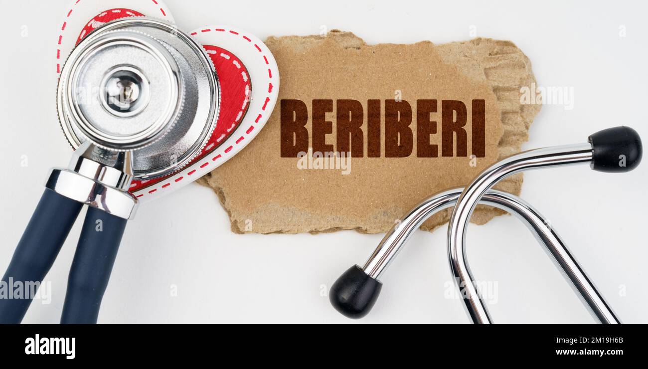 Medicine and health concept. On a white table lie a heart, a ...