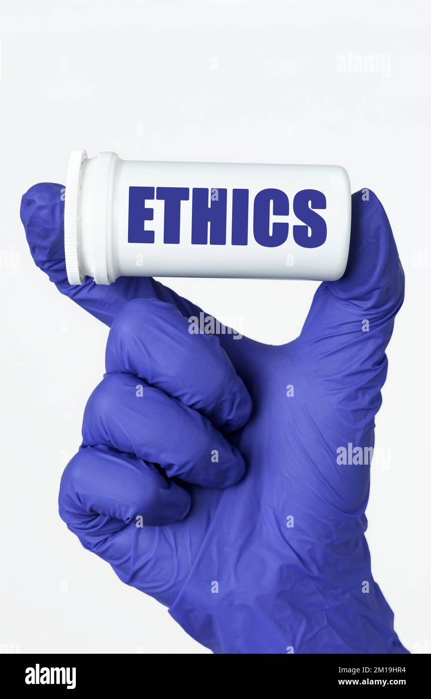 Medicine and health concept. The doctor has a box of pills in his hands ...